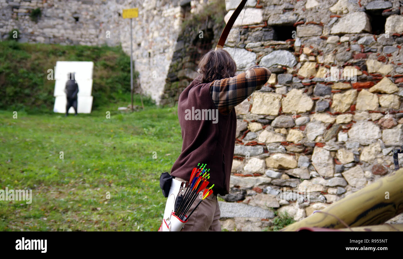Man bending bow hi-res stock photography and images - Alamy