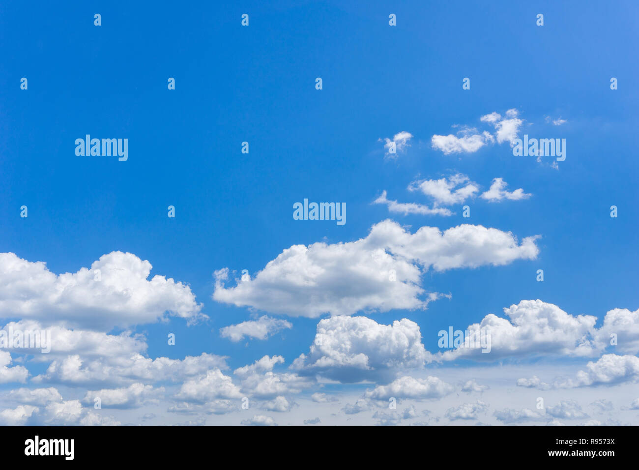 View of white fluffly Clouds on a beautiful Blue Sky Stock Photo - Alamy
