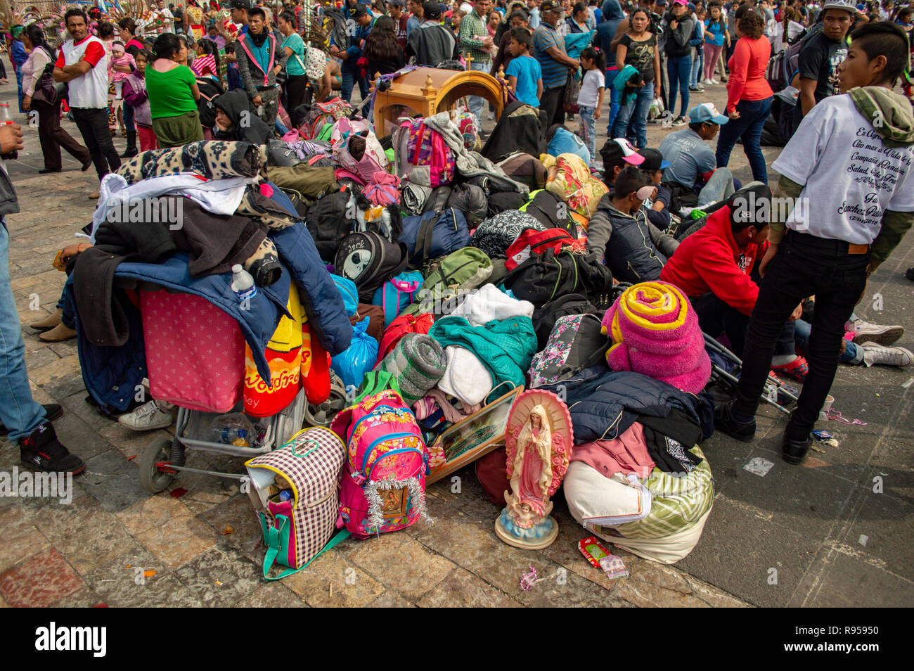 A pile of bags belonging to pilgrims at the Basilica of Our Lady of ...