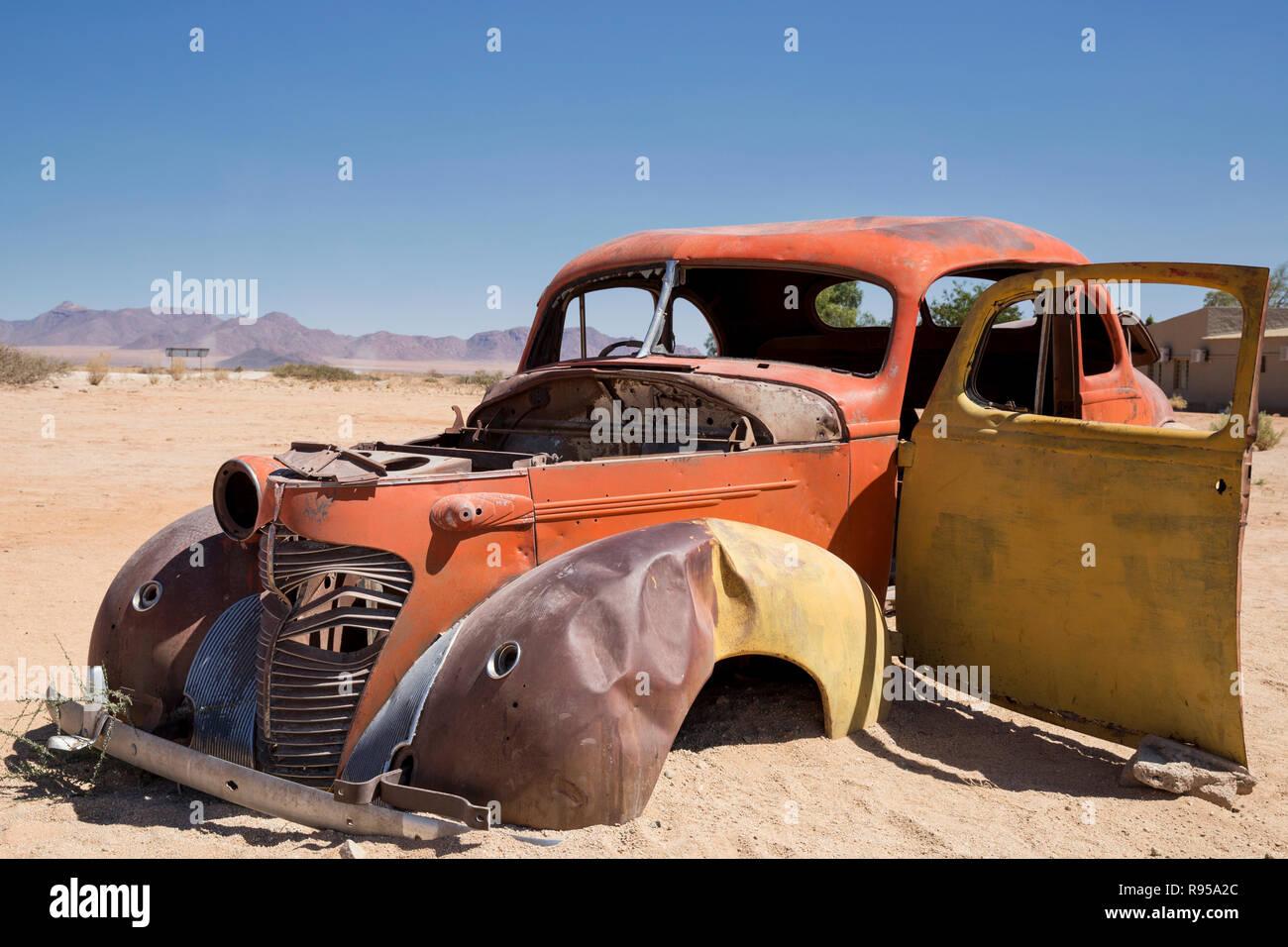 Abandoned car wreck in Namibian desert Stock Photo - Alamy