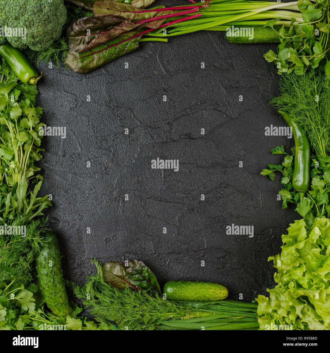 Frame of vegetables on black background Stock Photo - Alamy
