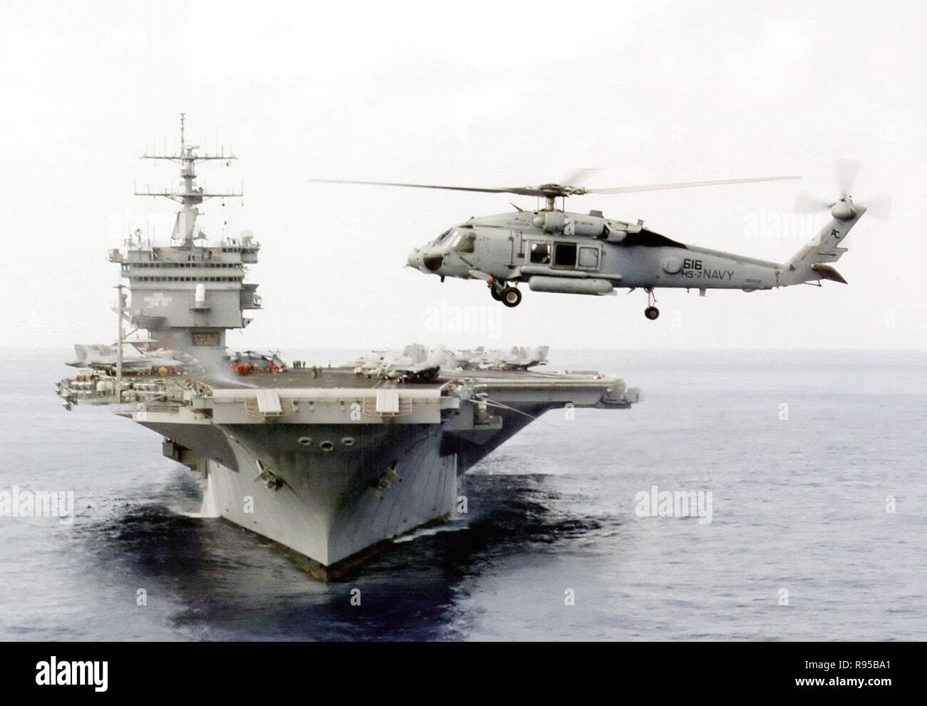 An SH-60 helicopter assigned to Helicopter Anti-Submarine Squadron ...