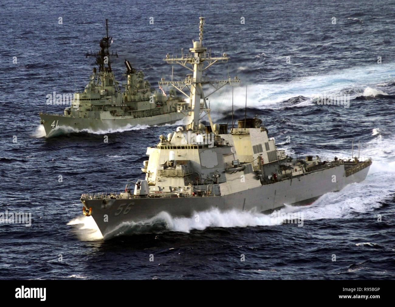 The HMAS Brisbane and USS John S. McCain (DDG 56) cruise side by side ...