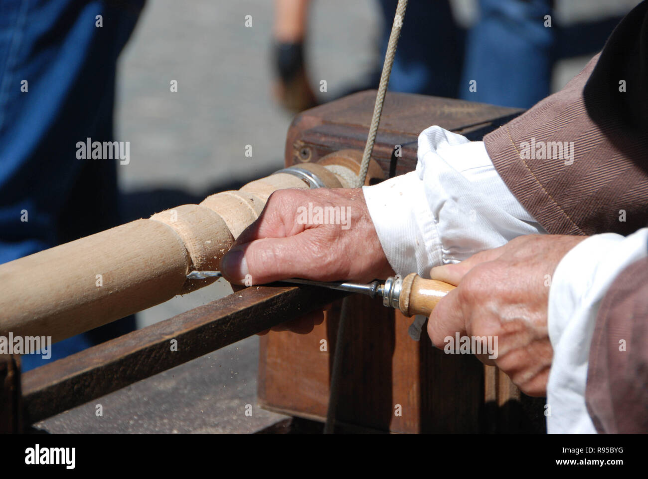 Turner works at one leg of a table Stock Photo - Alamy