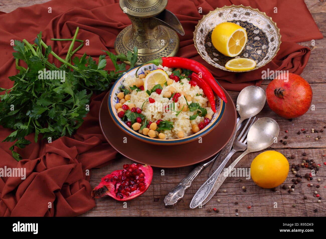 Eastern dish couscous with pomegranate and chickpeas Stock Photo - Alamy