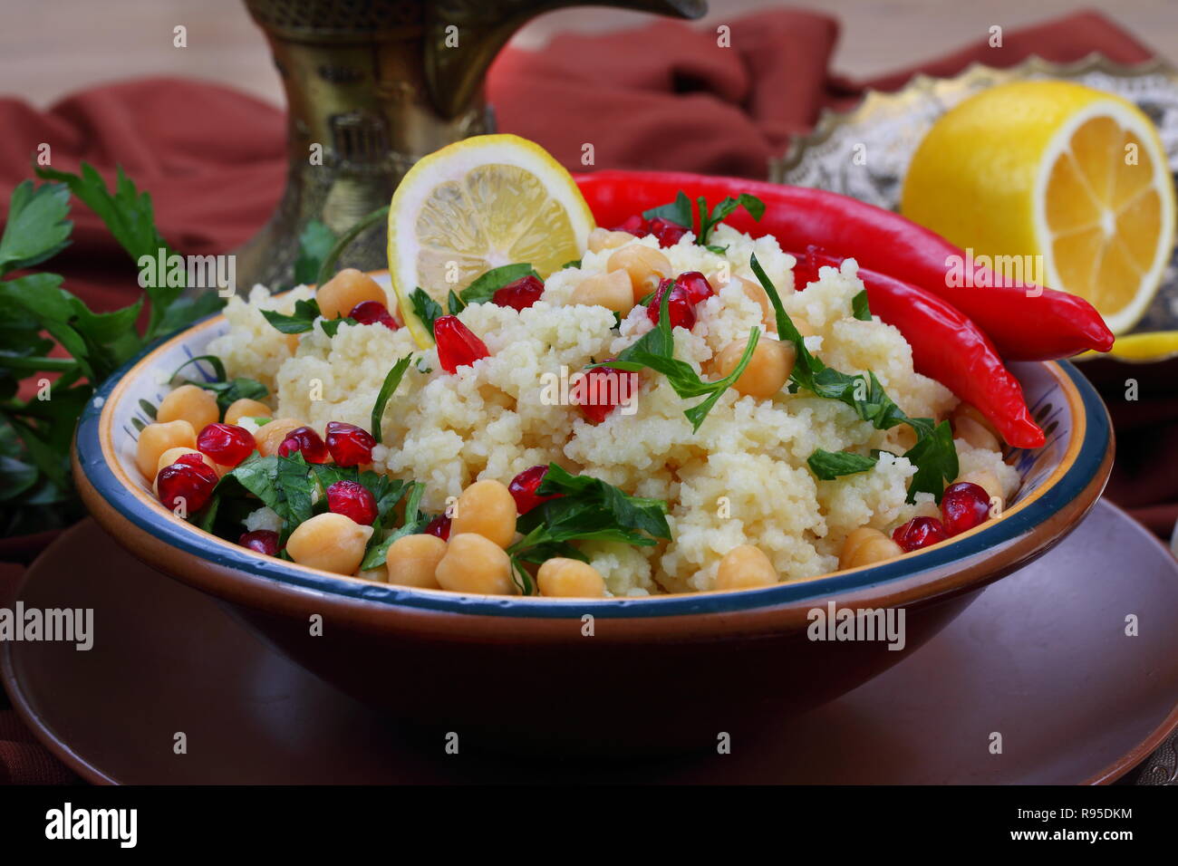 Eastern dish couscous with pomegranate and chickpeas Stock Photo - Alamy