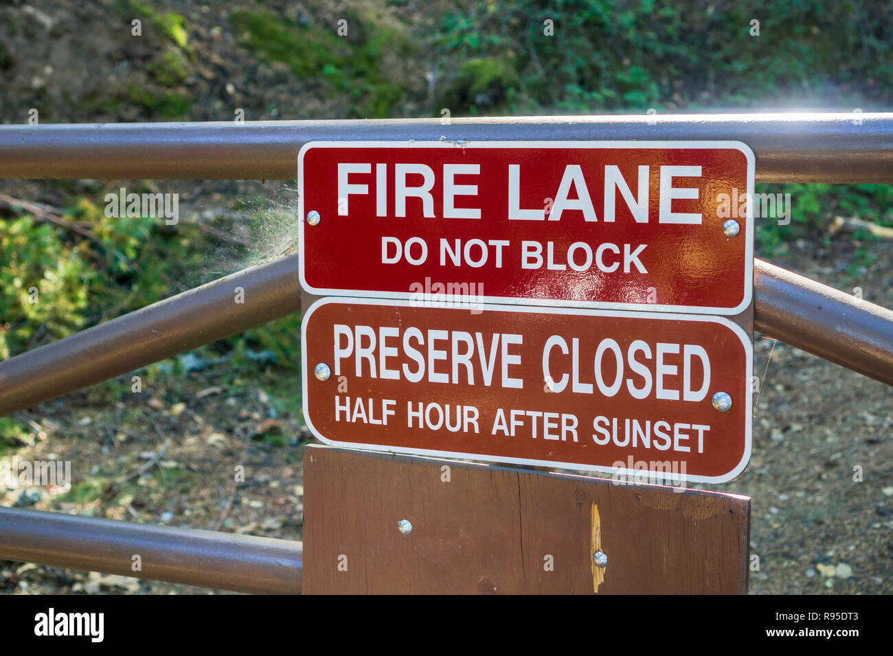 "Fire Lane; Do not block" and "Preserve Closed Half Hour After Sunset ...