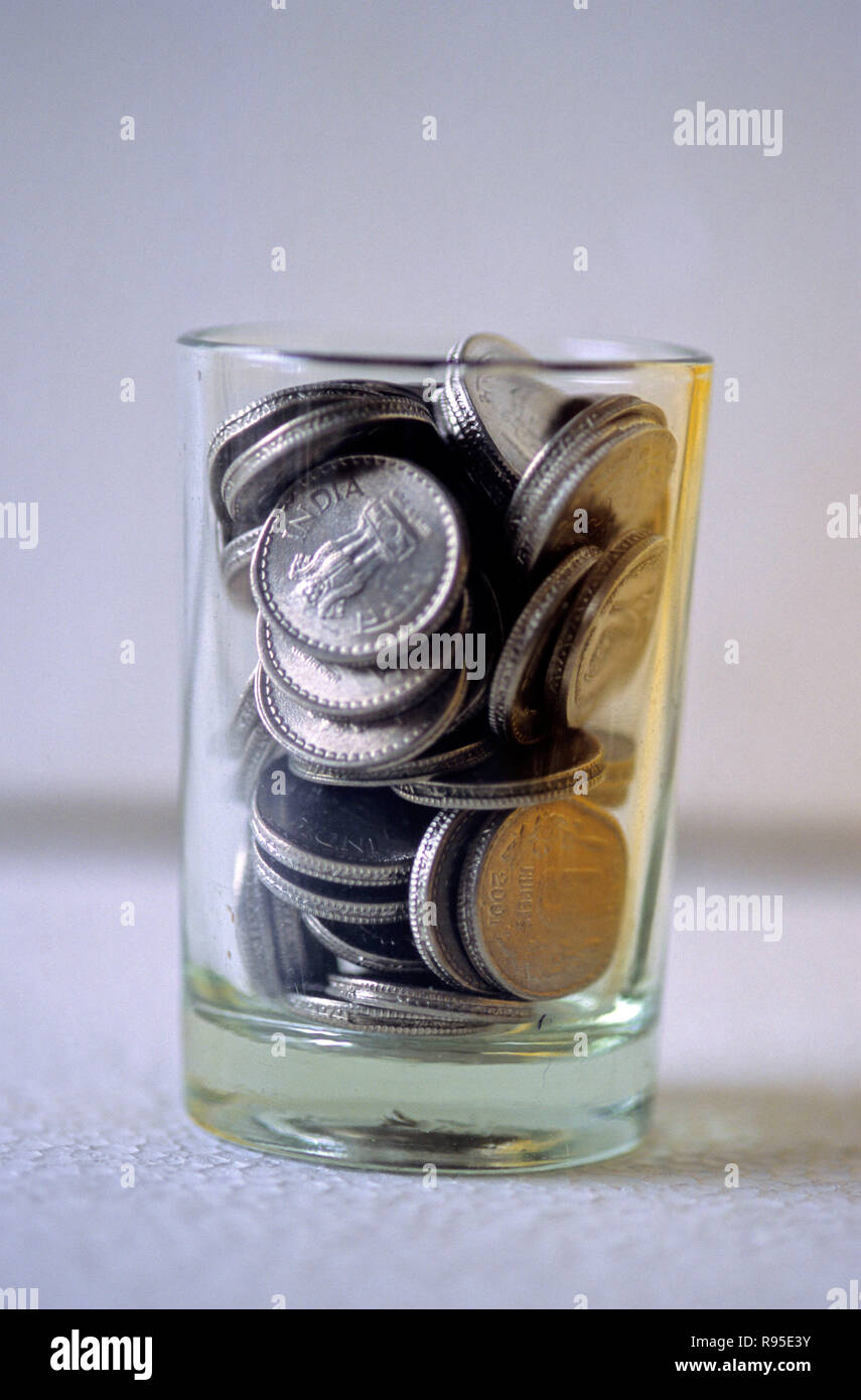 coins in glass Stock Photo - Alamy