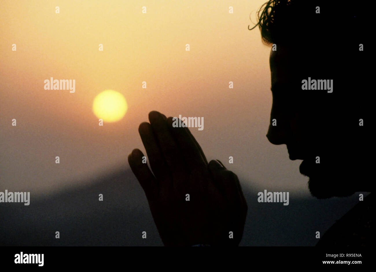 Religious man praying hi-res stock photography and images - Alamy