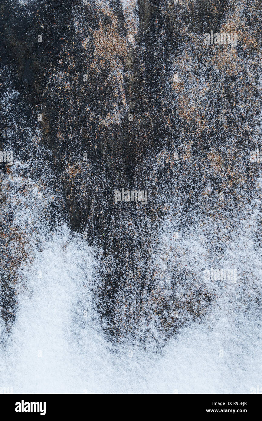 Close-up of snow on a rock in the winter, viewed from above Stock Photo ...