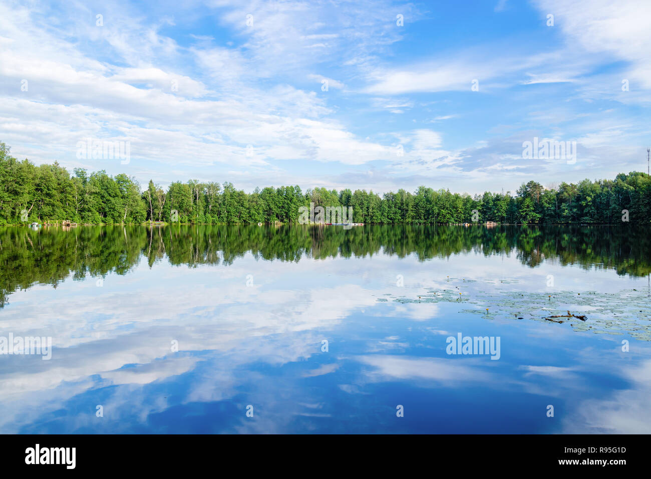 Beautiful lake with reflection of sky in water Stock Photo - Alamy