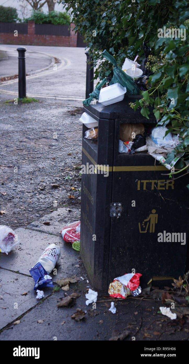Familiar urban street scene battling litter and once overflowing it ...