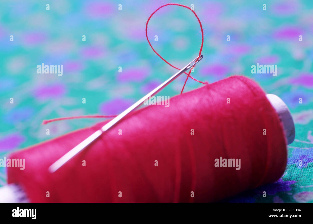 Needle and thread Stock Photo - Alamy