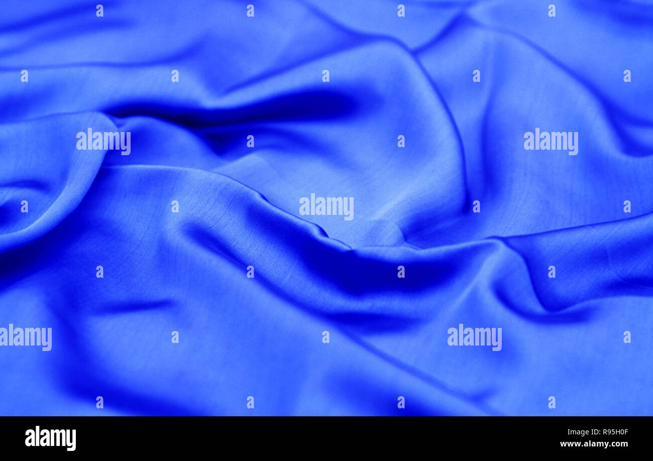 Blue silk fabric texture background Stock Photo - Alamy
