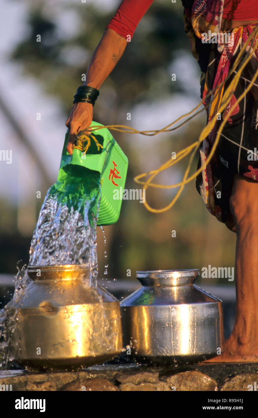 Brass pots water india hi-res stock photography and images - Alamy