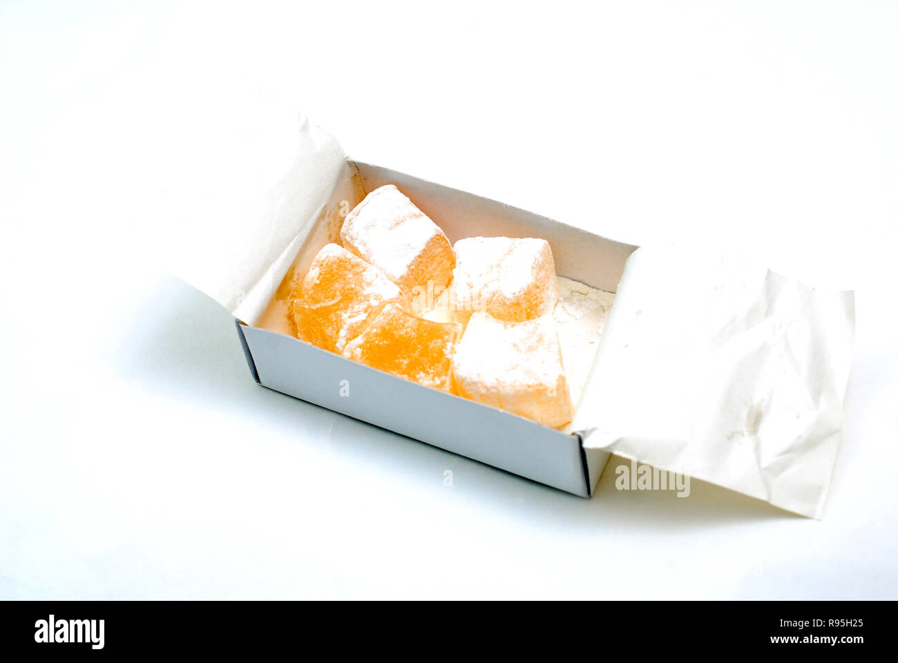 rahat lokum on white background, sweet food image Stock Photo - Alamy