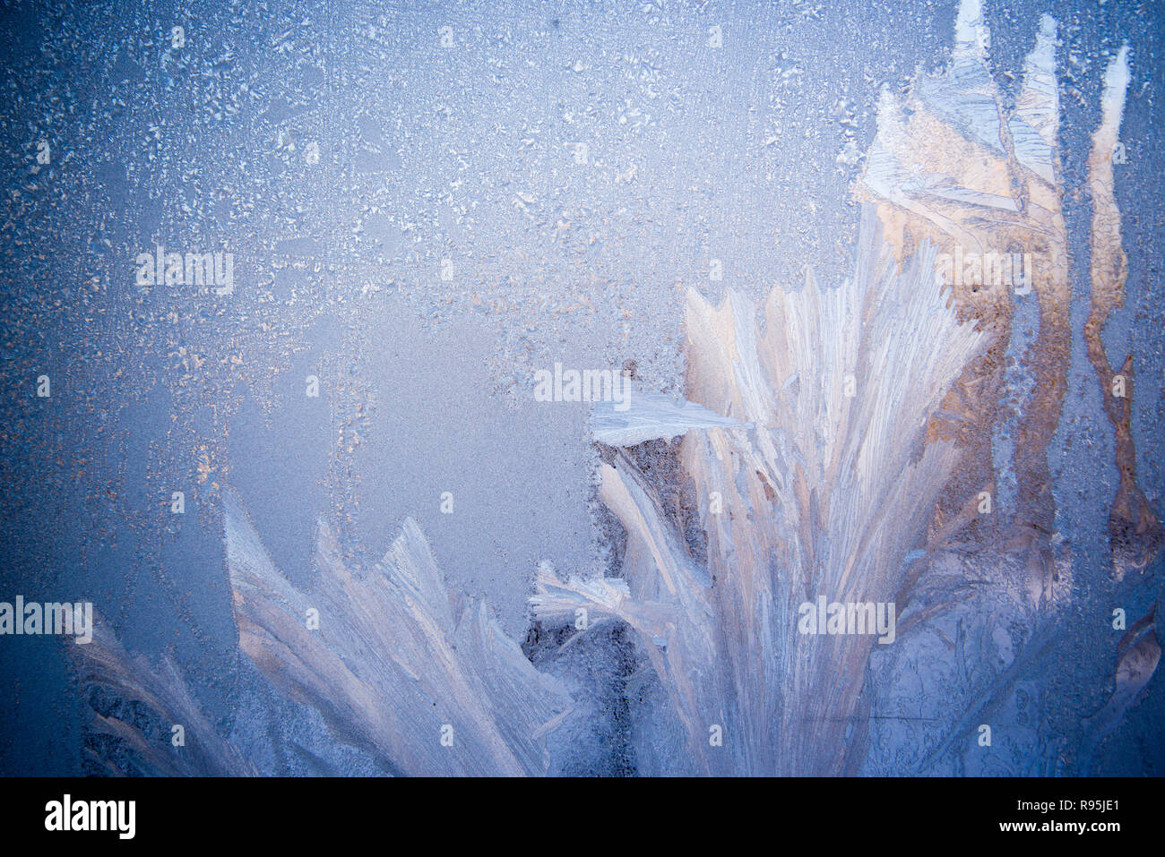 Frosty pattern on the glass. Winter Christmas abstract backdrop ...