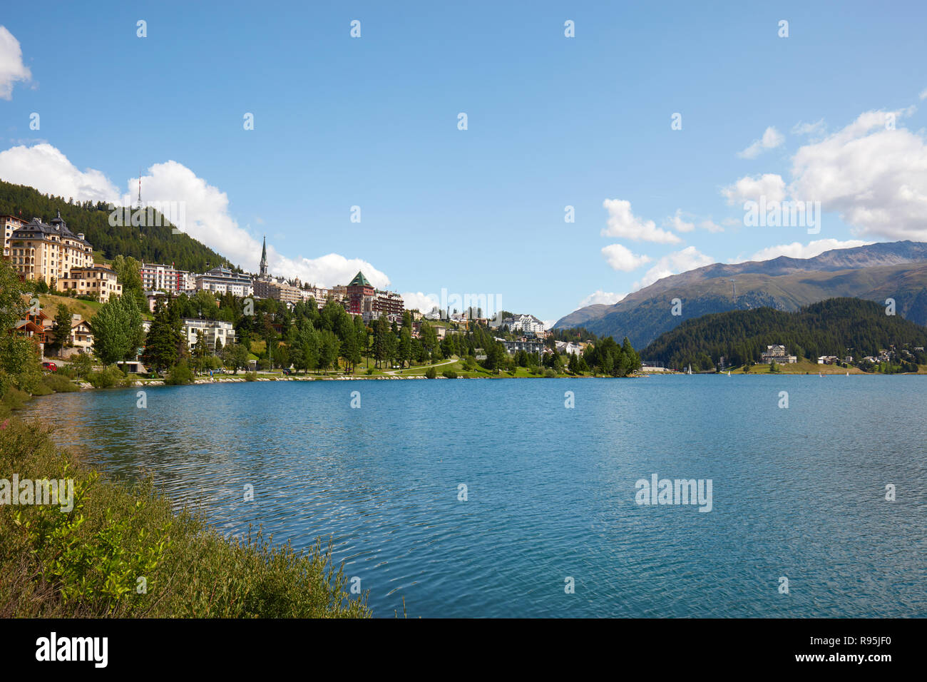 Sankt Moritz town and lake in summer, blue sky in Switzerland Stock ...