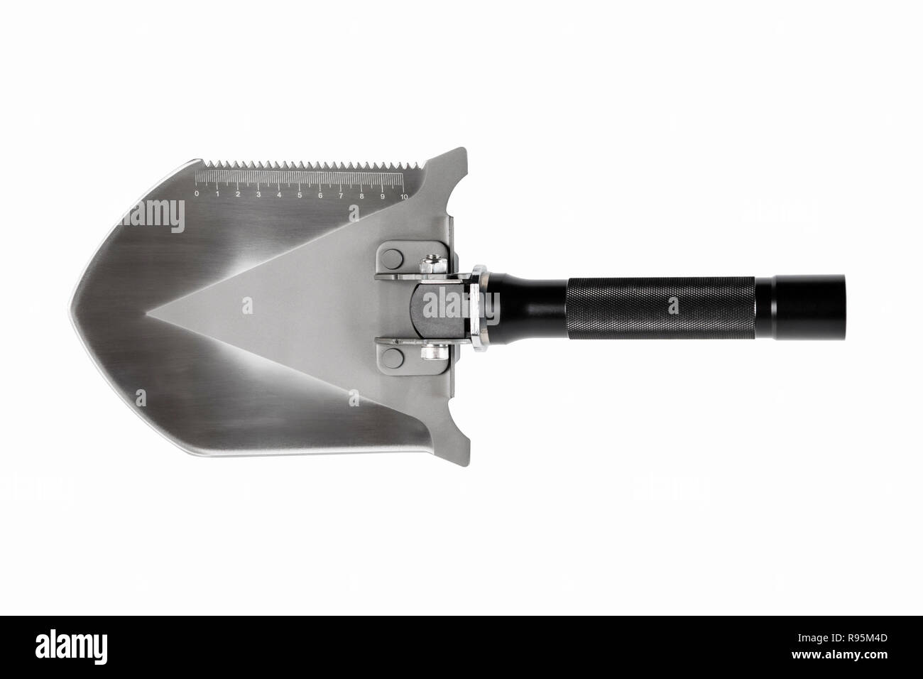 Sharp metal shovel with a saw on white background. Isolated Stock Photo ...