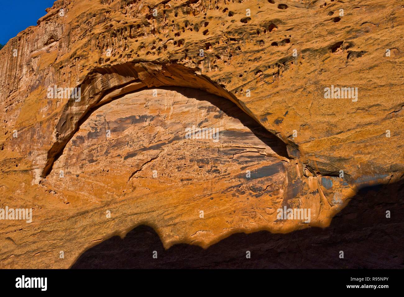 Utah, Boulder, Burr Trail Road views in Long Canyon, an Arch Forming ...