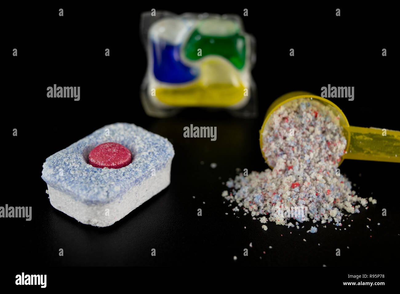Powder and tablets for the dishwasher on the kitchen table. Cleaning ...