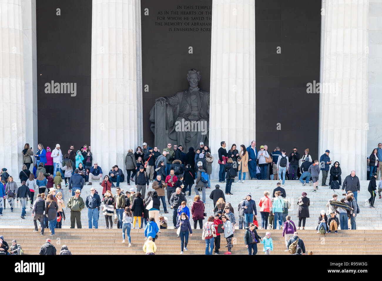 Washington DC, USA - April 5, 2018: Closeup of people, tourists walking ...