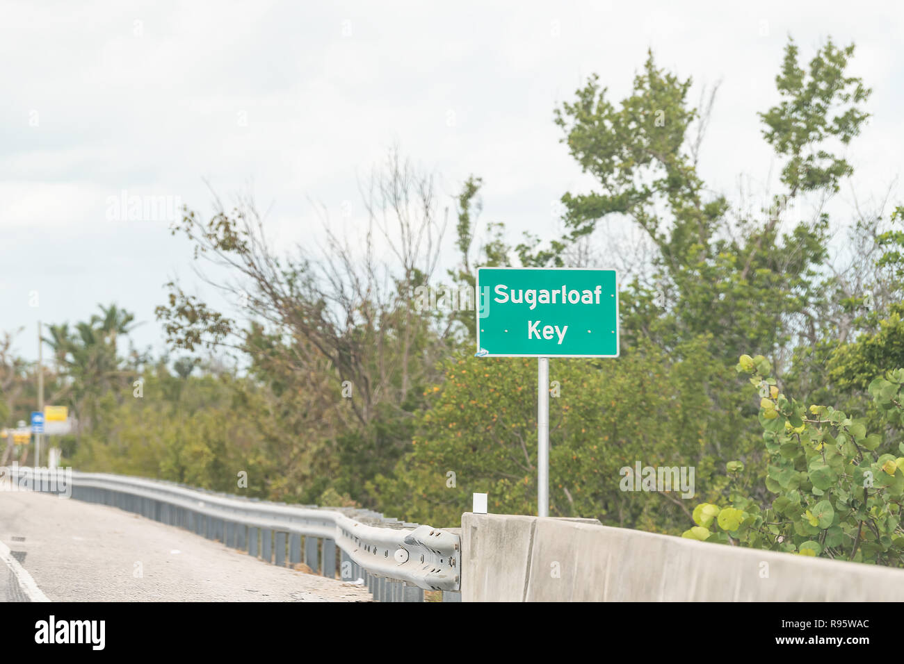 Sugarloaf key island green road, traffic, information sign by ocean ...