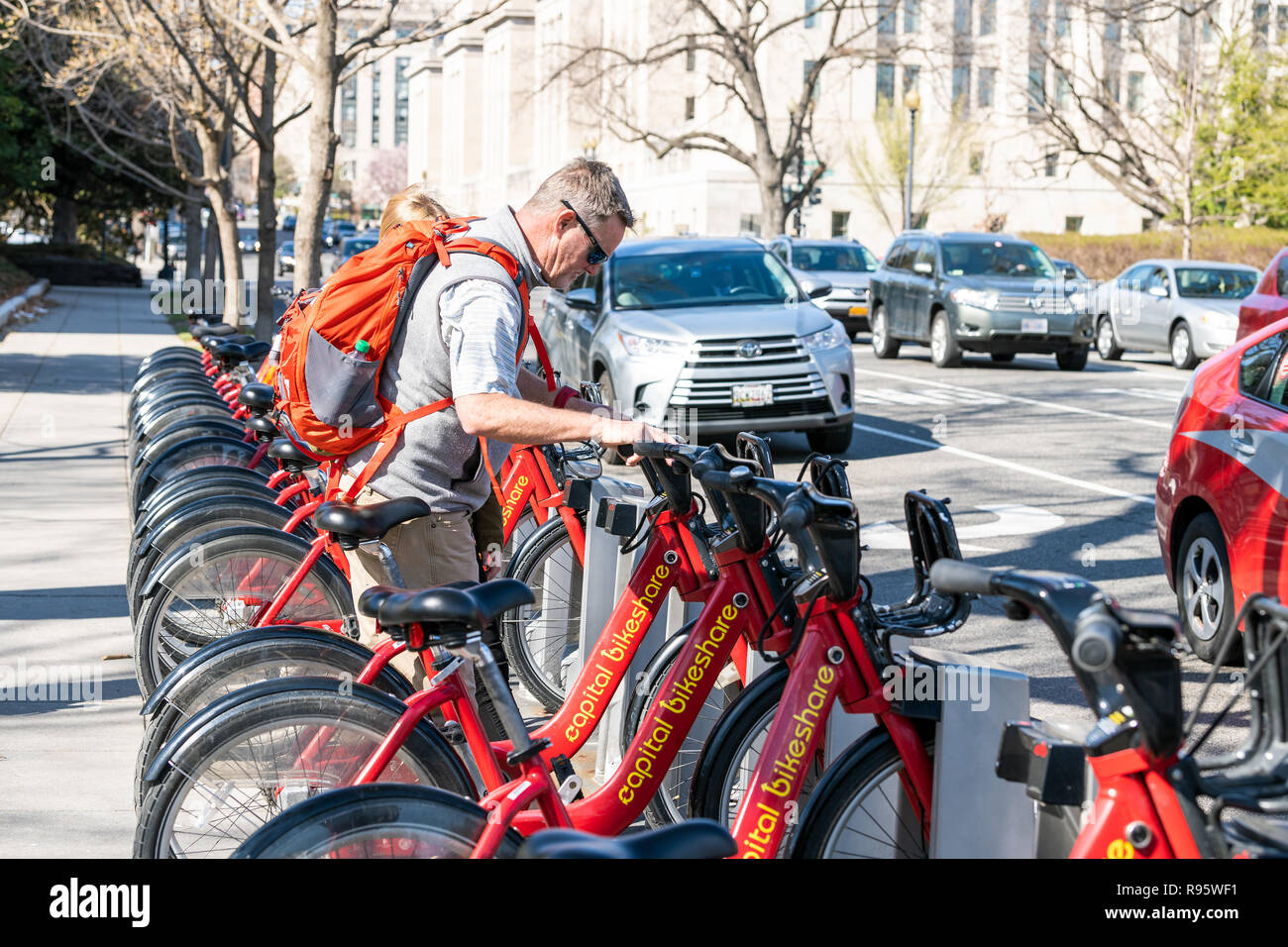 Washington DC, USA - April 5, 2018: Capital bikeshare red bicycles row ...
