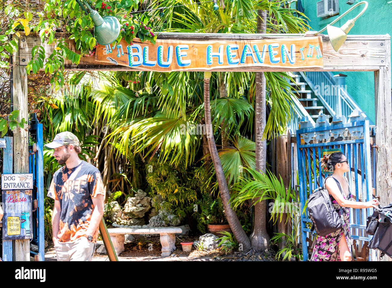 Key West, USA - May 1, 2018: People walking by Blue heaven restaurant ...