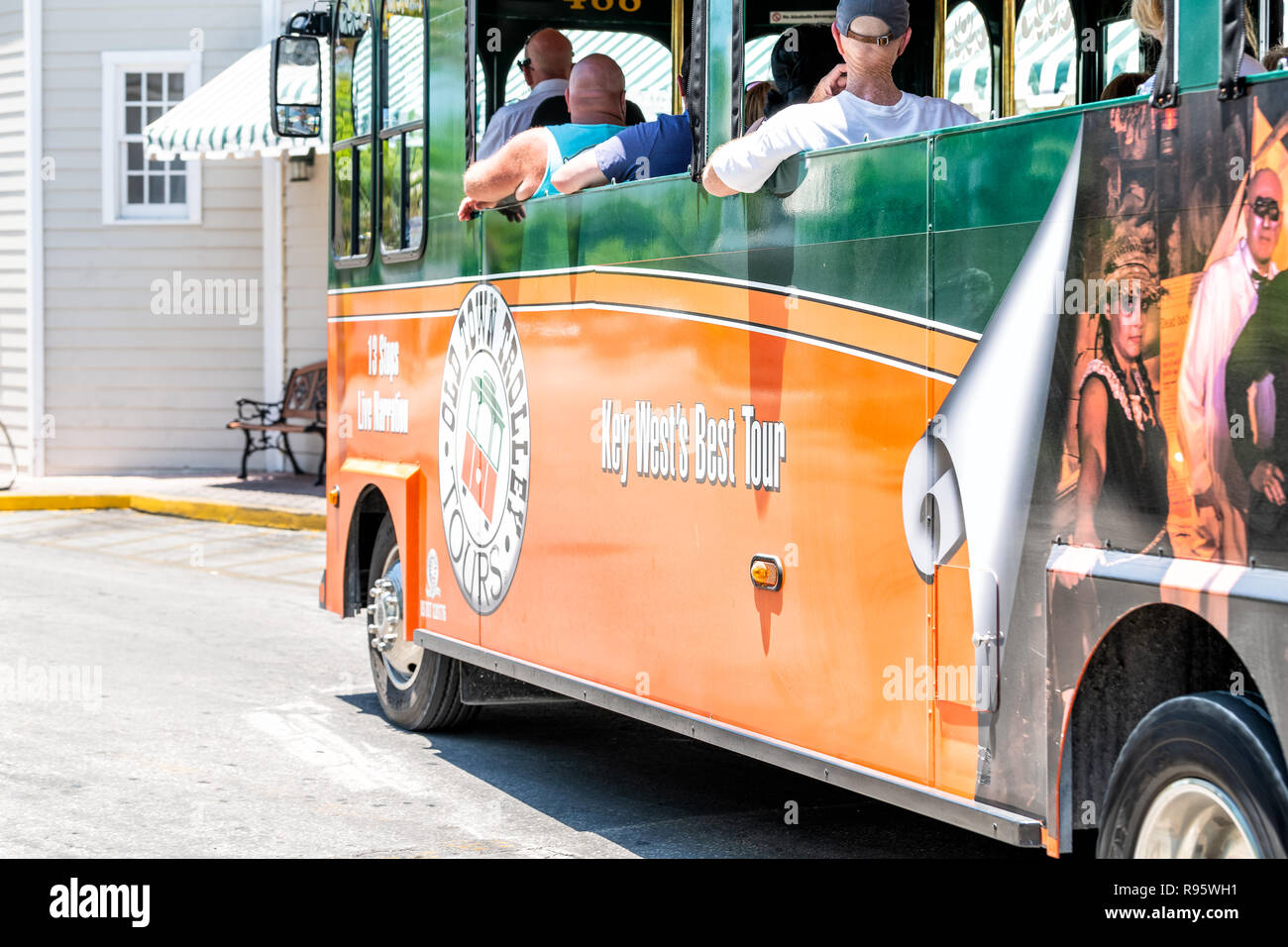Key West, USA - May 1, 2018: Behind, back view of old town trolley best ...
