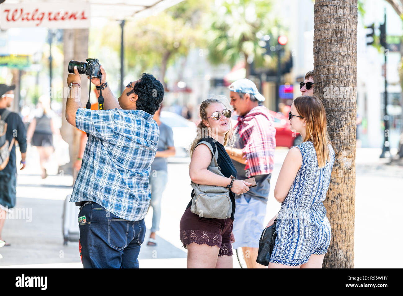 Key West, USA - May 1, 2018: Group of young people, tourists, women ...