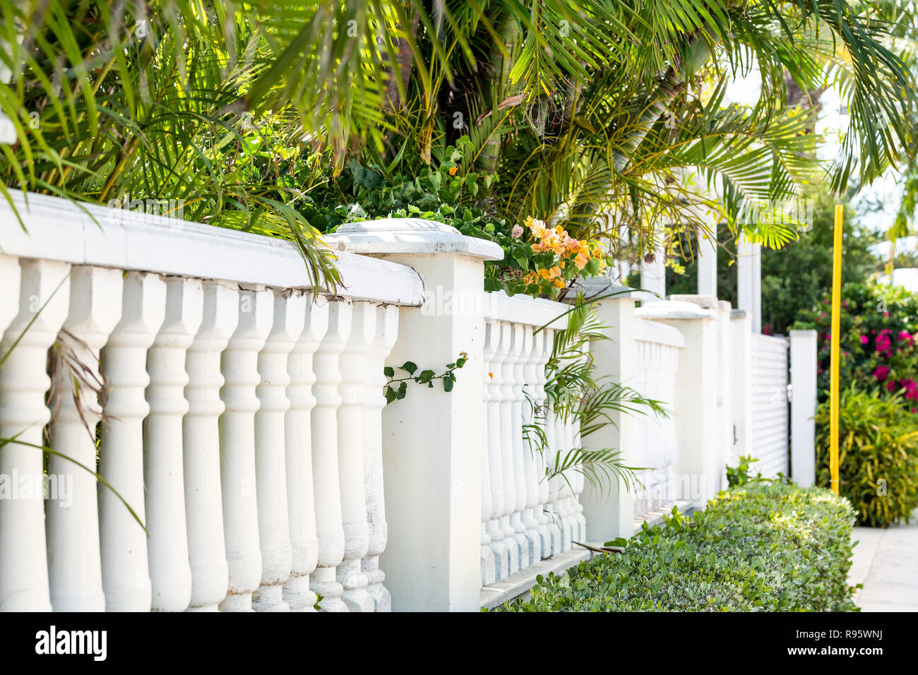 White stone column, columns wall, fence, wall in residential area with ...