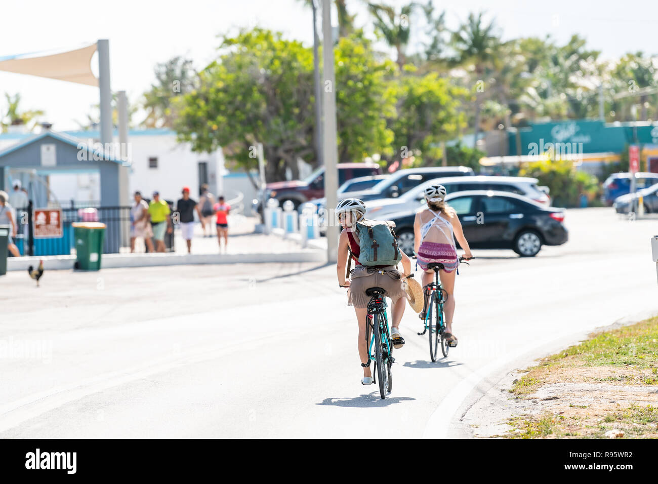 Back view girl riding bicycle hi-res stock photography and images - Alamy