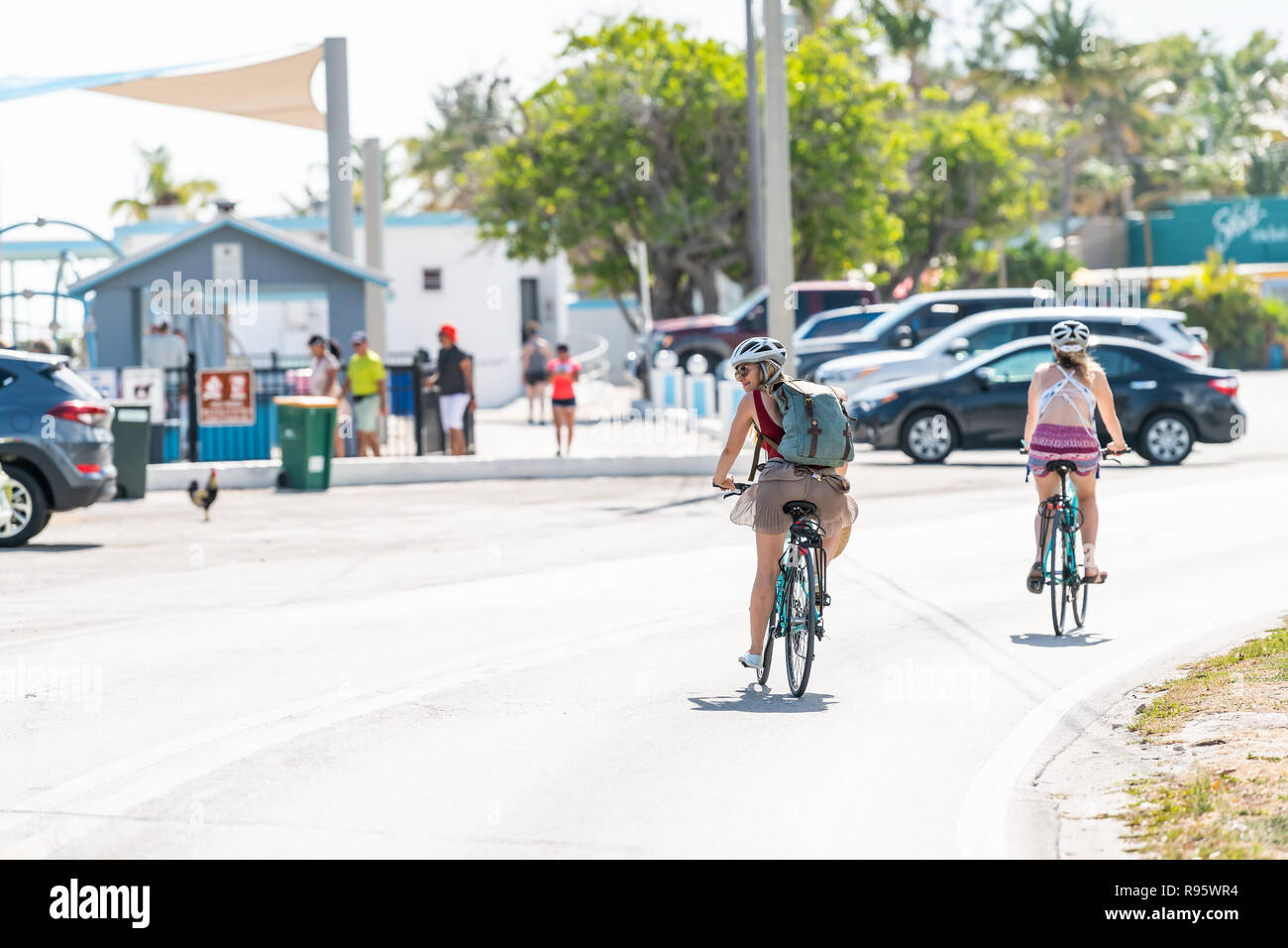 Back view girl riding bicycle hi-res stock photography and images - Alamy