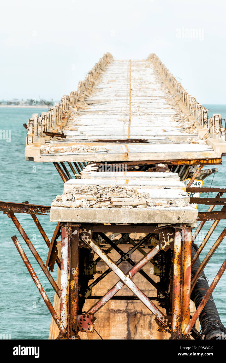 Old Seven Mile Bridge piling support, landscape of Florida Keys water ...