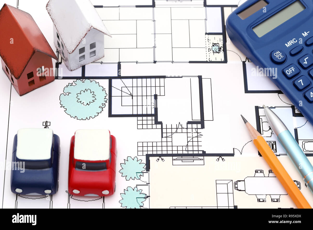 Miniature model of house, car and blueprints, construction plan Stock ...
