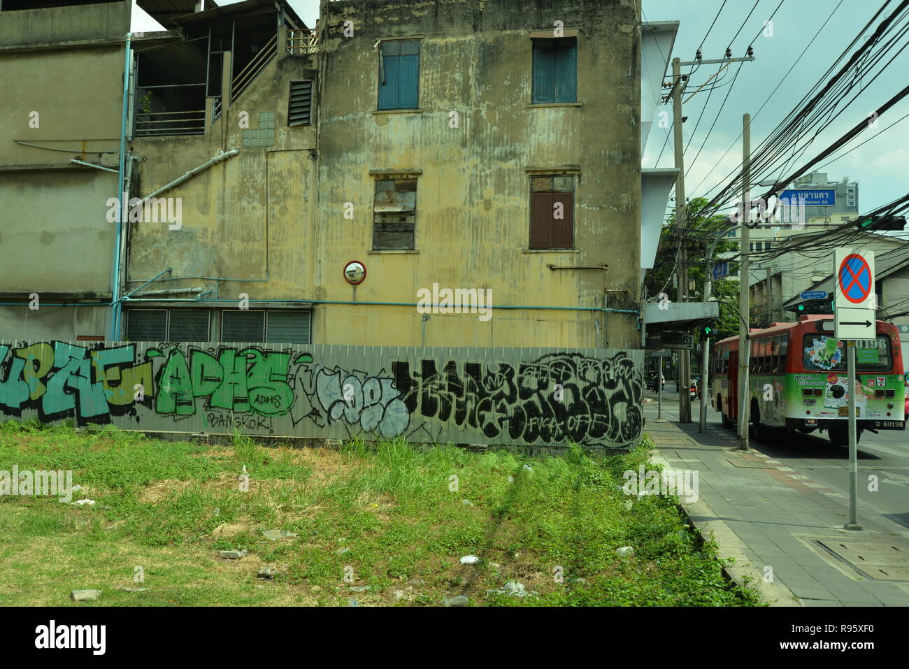 Derelict building beside empty land, pasakdek Stock Photo - Alamy