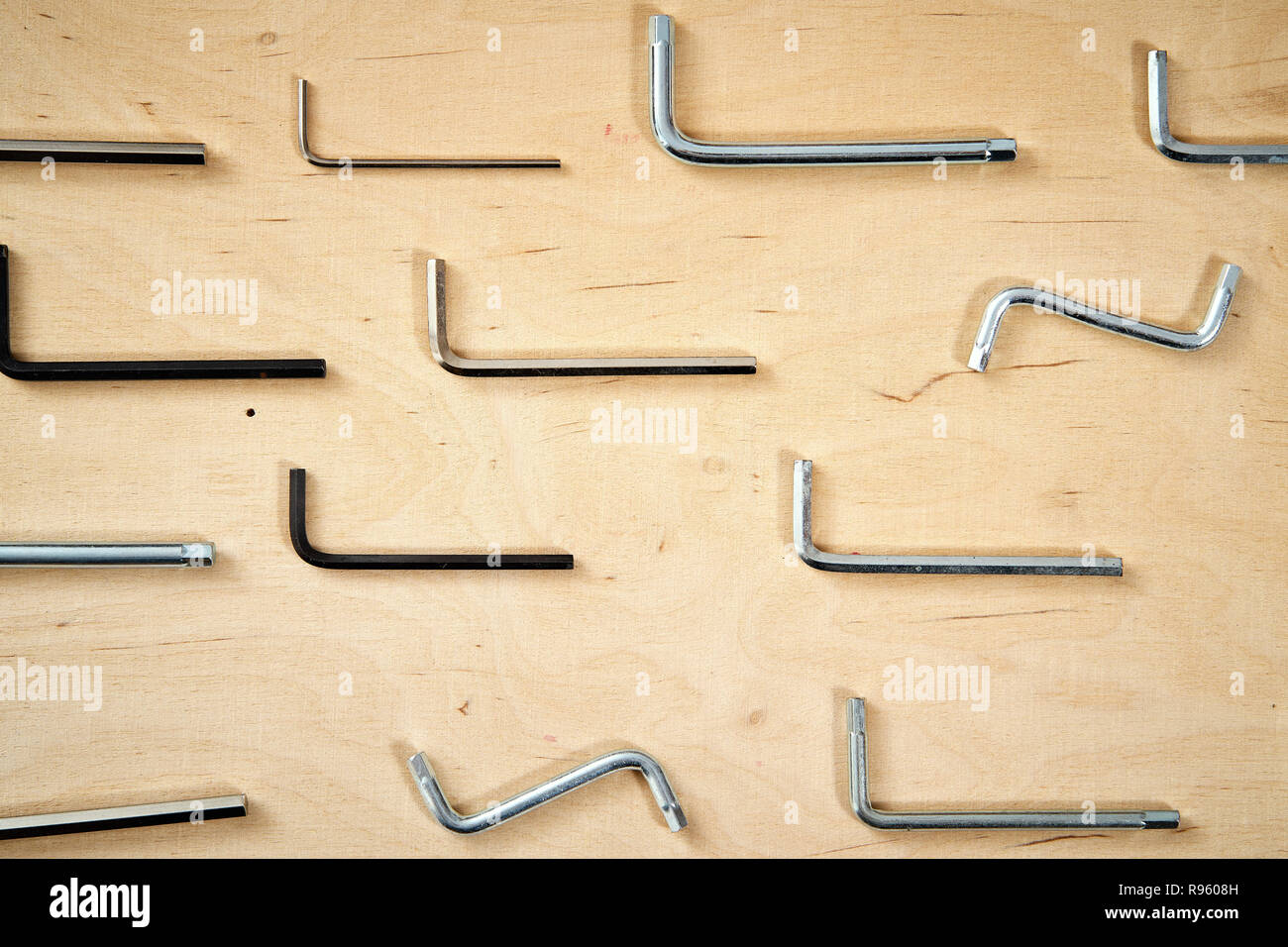 pattern background of various allen keys on wooden work table Stock ...
