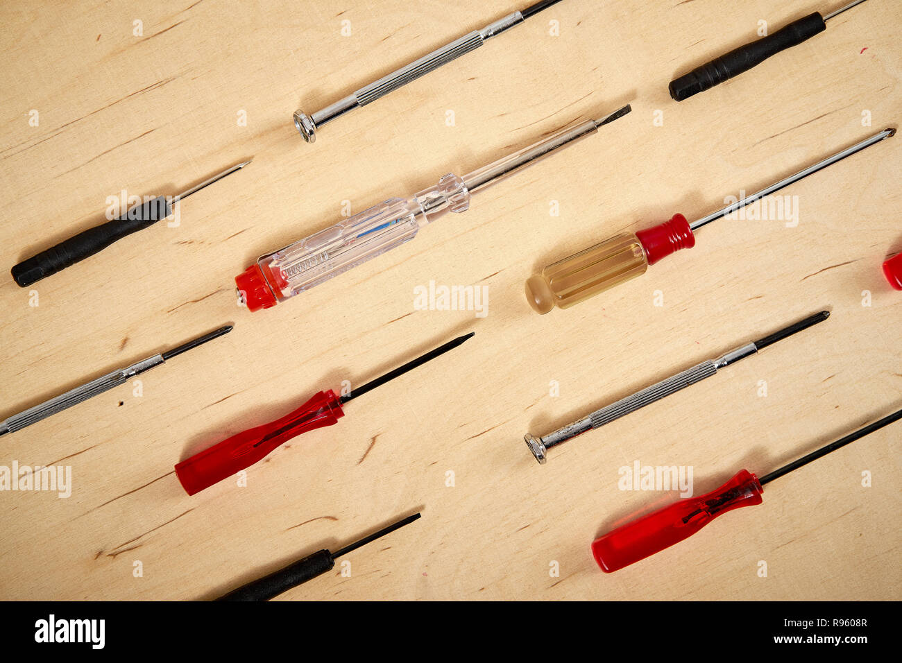 pattern background of various screwdrivers on wooden work table Stock ...