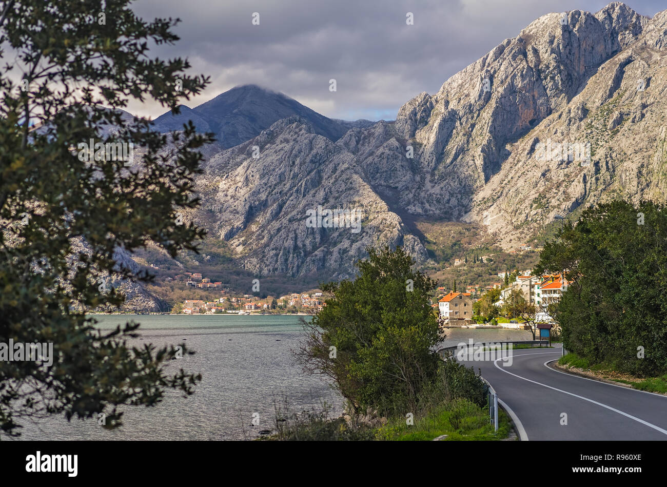 Narrow twisting and turning road through the stunning mountain ...