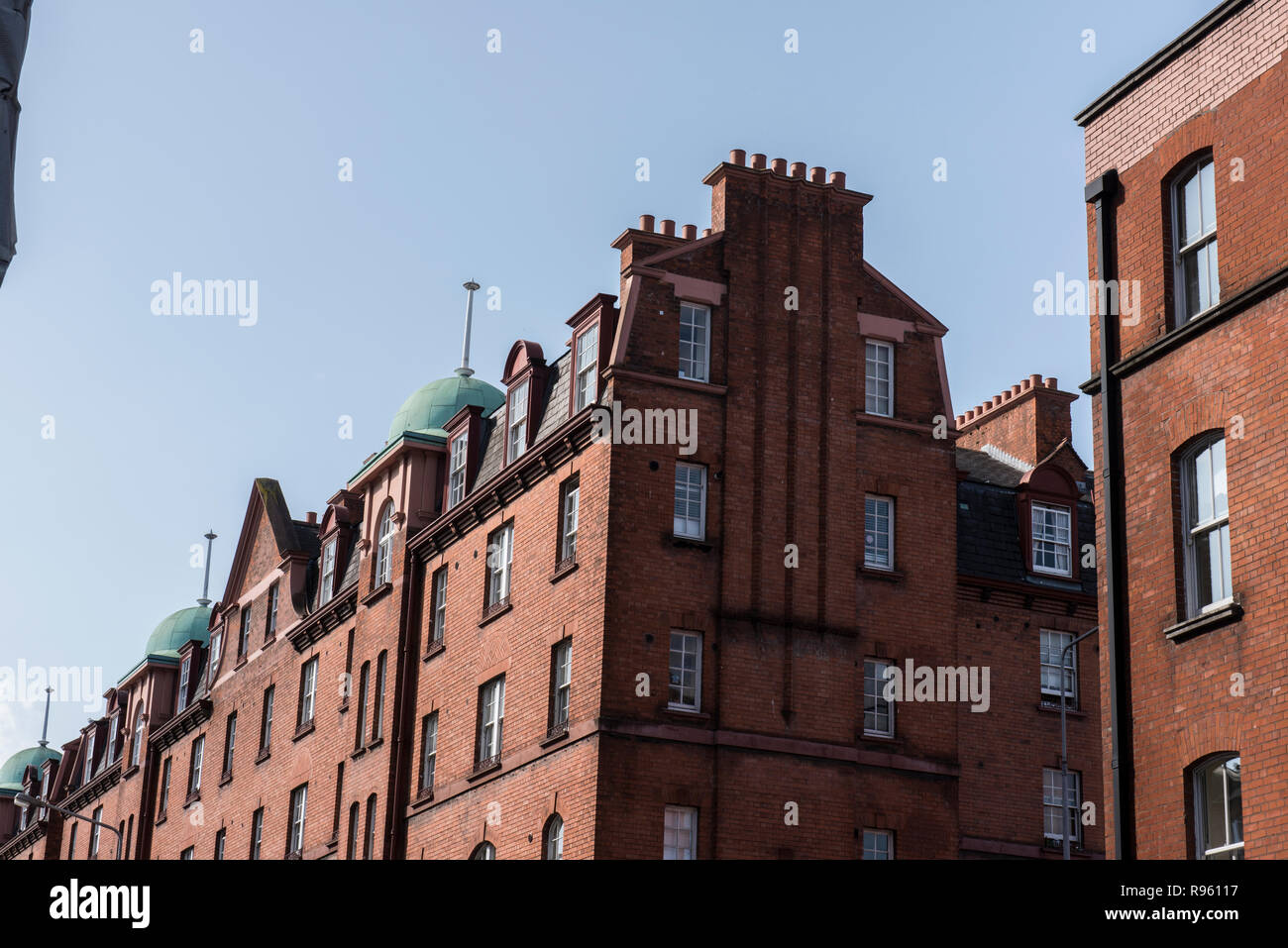 Part of the Dublin Castle Building in Ireland. The building is red in ...