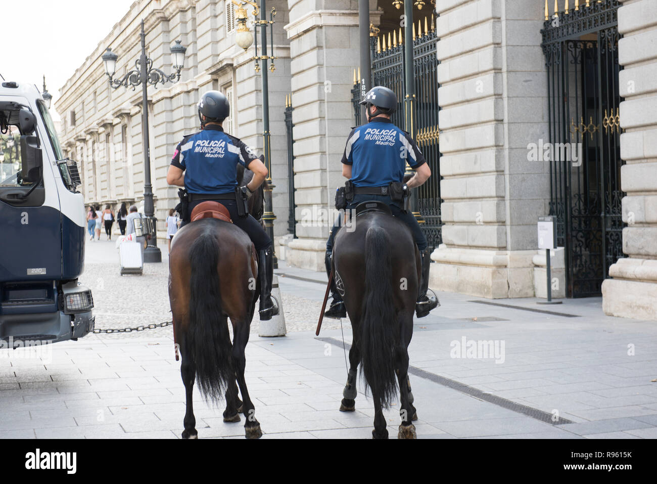 Horse Mounted Policemen guarding the streets of the city. The policemen ...