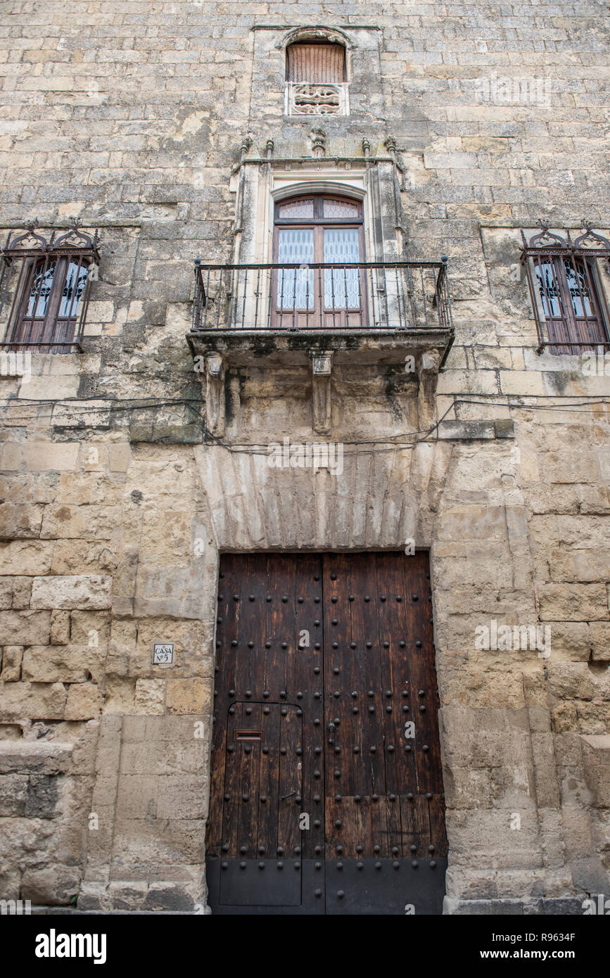 Closeup of a locked and closed wooden door is seen on this picture. The ...