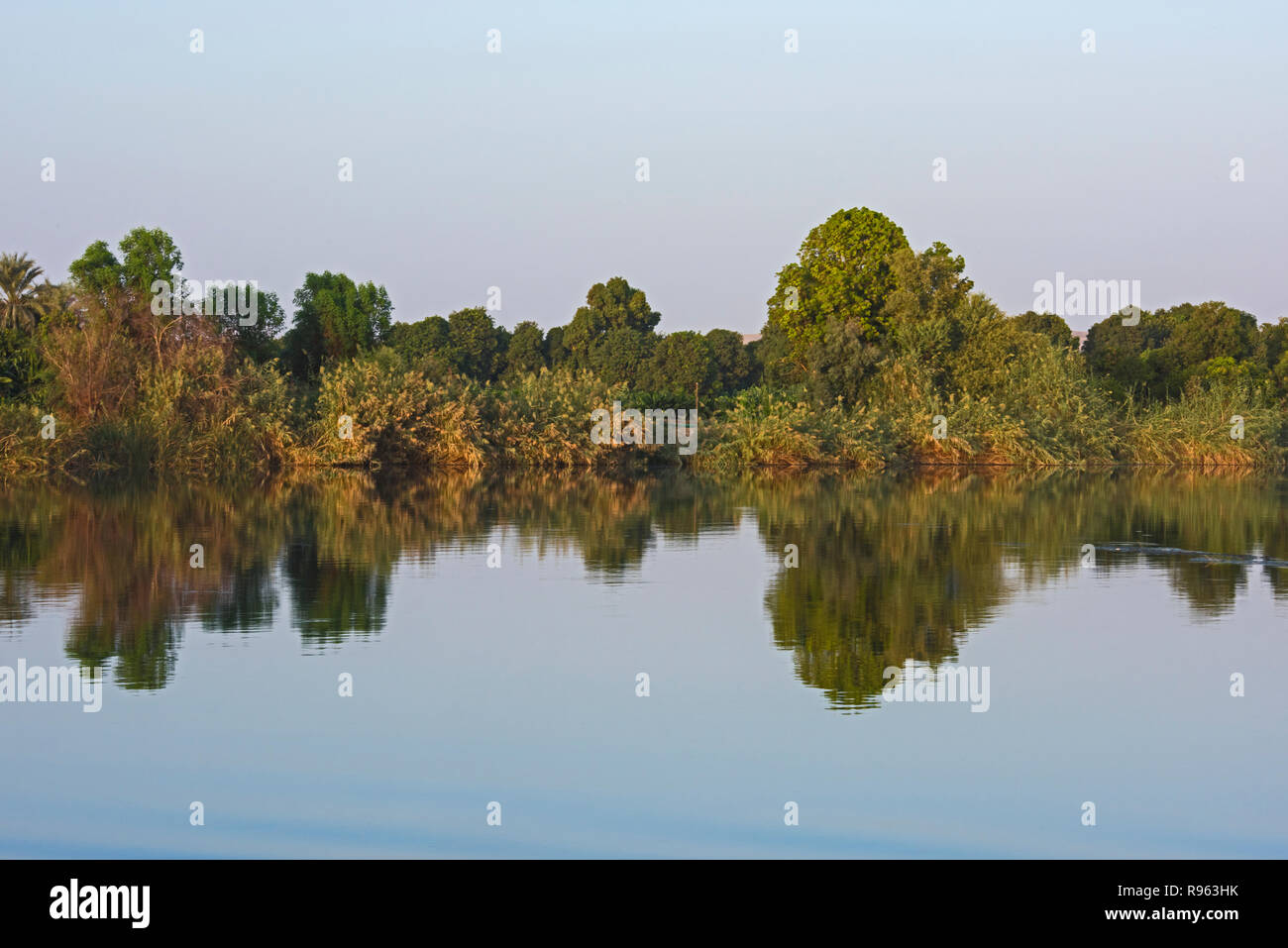 View across large wide river Nile in Egypt through rural countryside ...