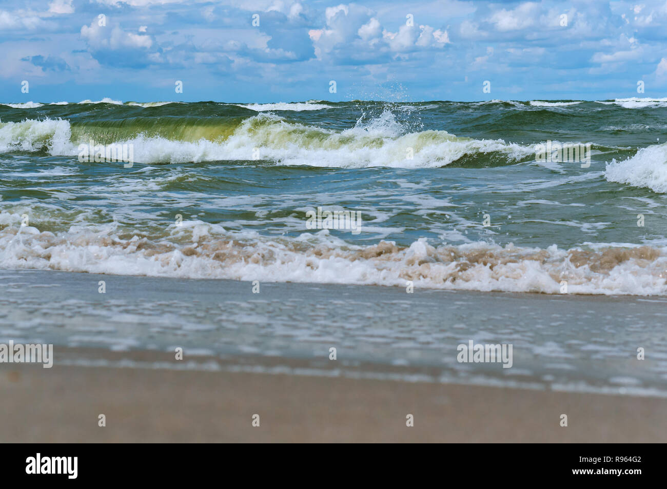green sea wave, small wave with white foam Stock Photo - Alamy