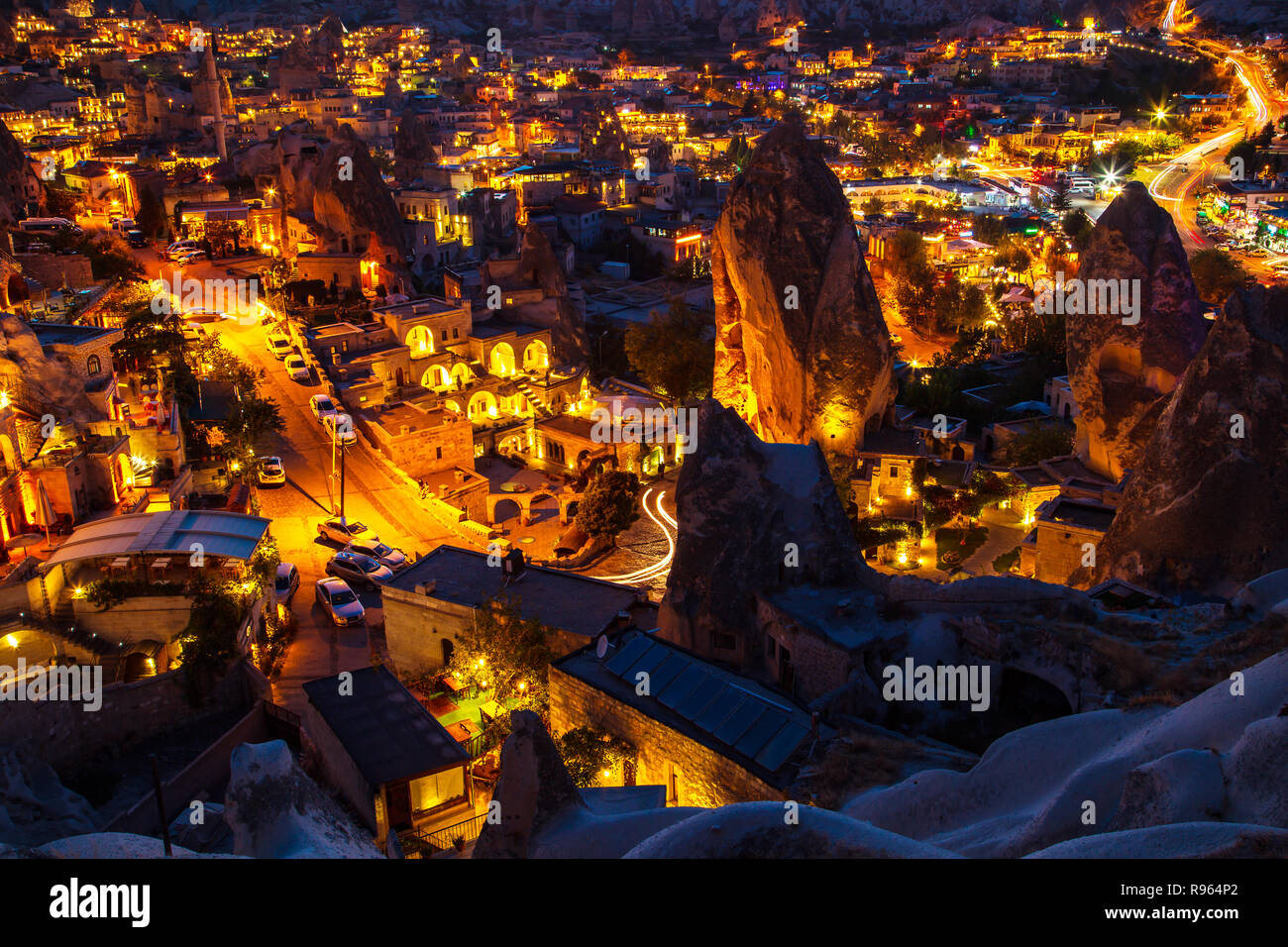 Illuminated at night streets of Goreme, Turkey, Cappadocia. The famous ...