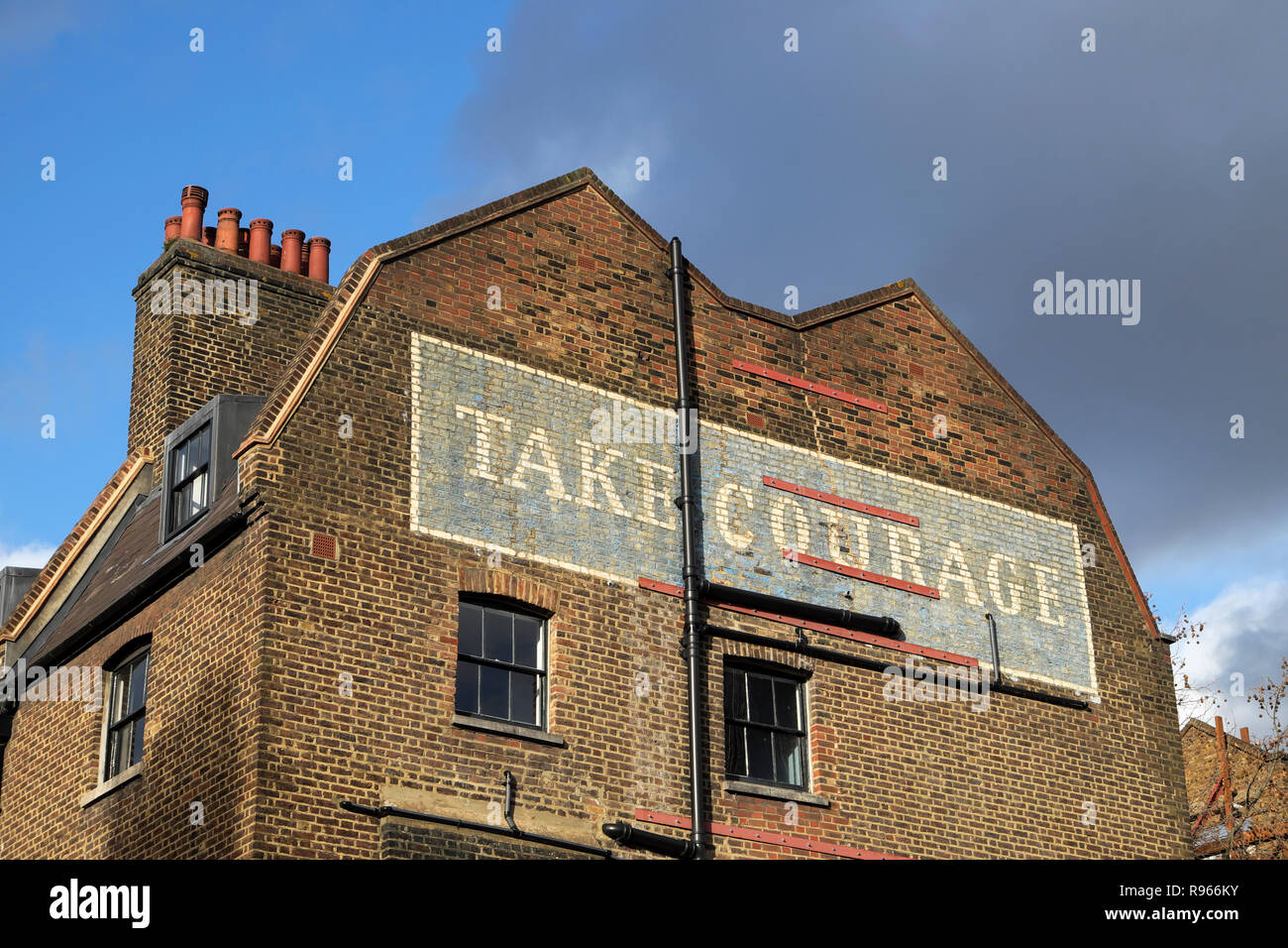 Take Courage Brewery vintage advert sign on the side of brick building ...