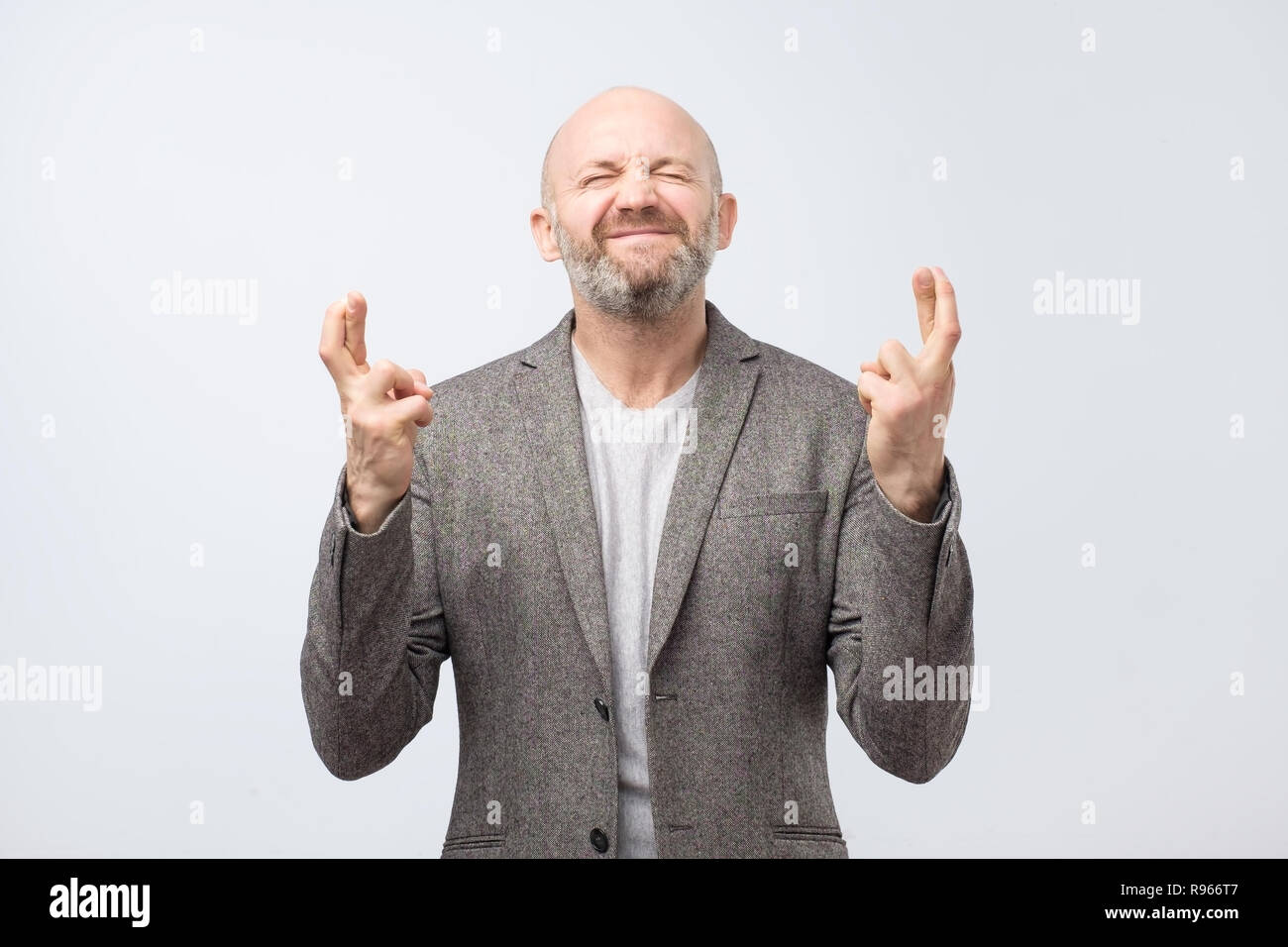 Praying man suit hi-res stock photography and images - Alamy
