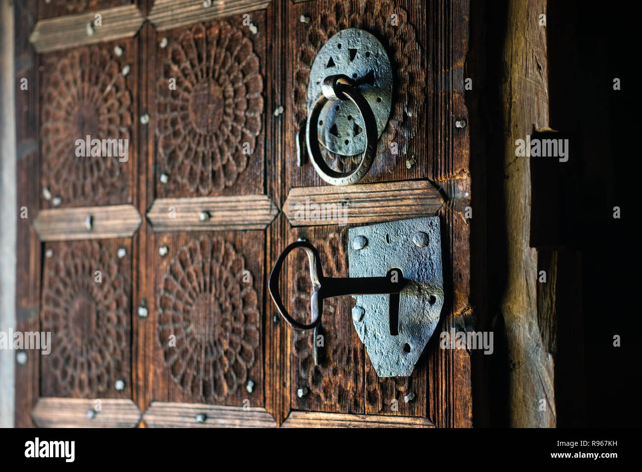Big key in rustic door of wooden church Stock Photo - Alamy