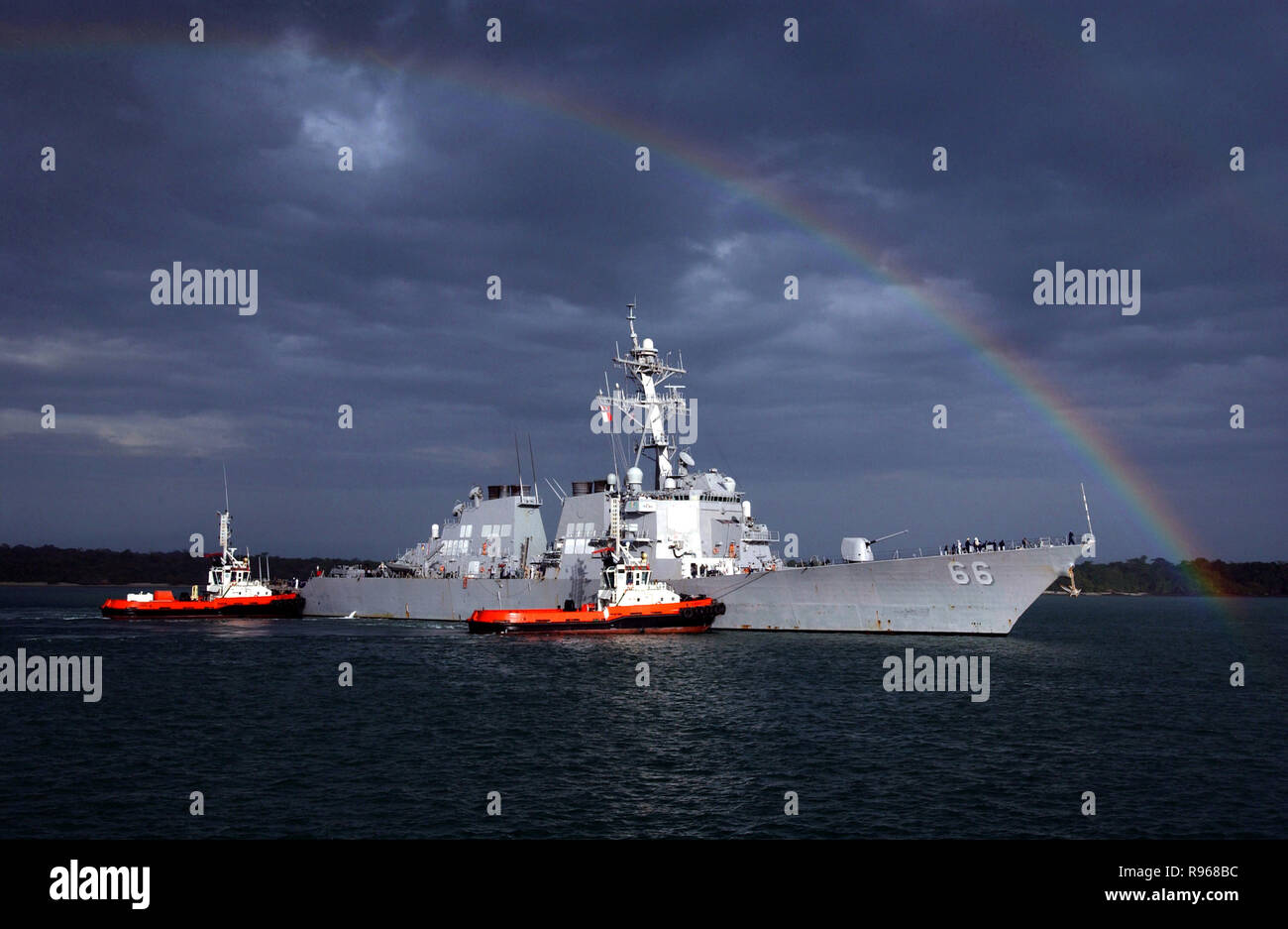 A rainbow arches over the guided missile destroyer USS Gonzalez (DDG 66 ...